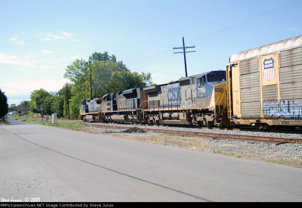 CSX 9052,4831,7766 Q201 Heads south out of town